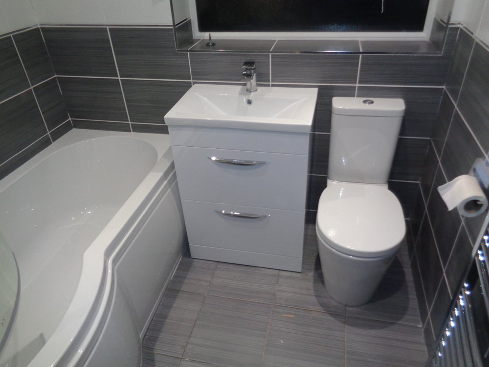 A Bathroom Refitted Including Storage Draw Sink Unit